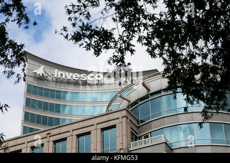 A logo sign outside of the headquarters of Invesco Ltd., in Atlanta ...