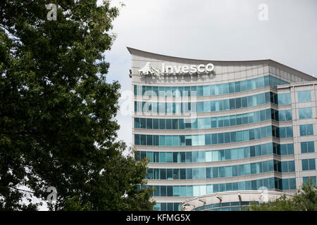 A logo sign outside of the headquarters of Invesco Ltd., in Atlanta ...