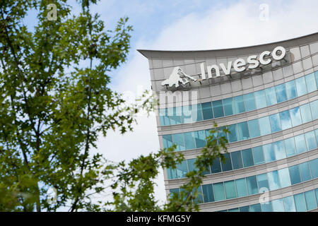 A logo sign outside of the headquarters of Invesco Ltd., in Atlanta ...