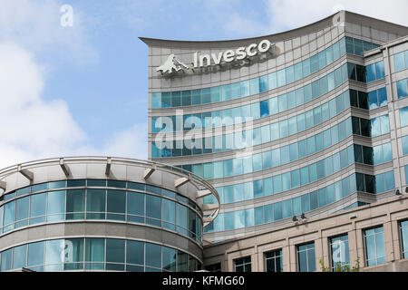 A logo sign outside of the headquarters of Invesco Ltd., in Atlanta ...