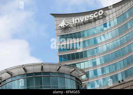 A logo sign outside of the headquarters of Invesco Ltd., in Atlanta ...