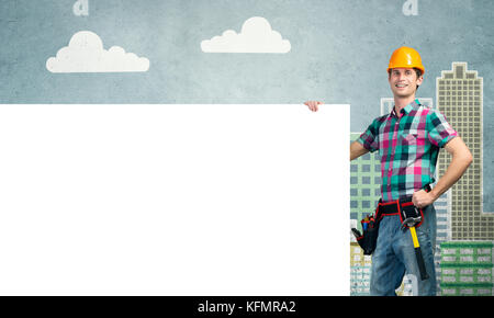 Repairman demonstrating banner Stock Photo - Alamy