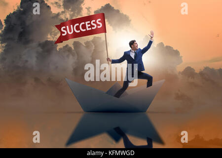 Businessman riding paper boat ship in winning concept Stock Photo - Alamy