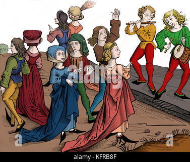 Medieval dancers and musicians playing pipe & tabor on Christmas night ...