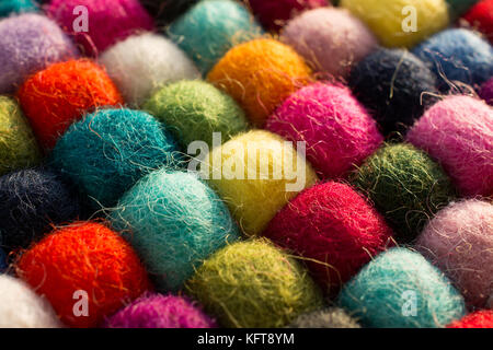 Geometric background with balls of colored synthetic wool Stock Photo ...