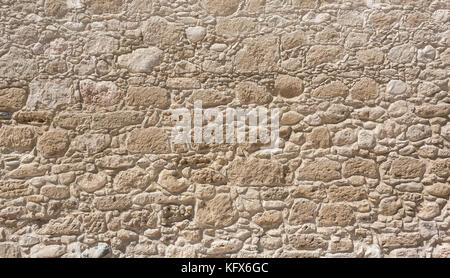 Istrian white stone ancient wall with square blocks as background ...
