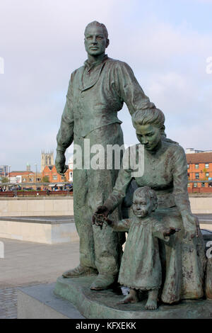 Hull Marina - Immigrants statue by Neil Hadlock Stock Photo - Alamy