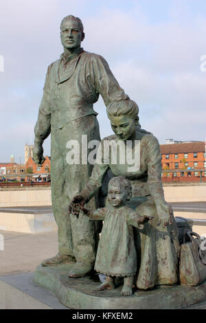 Hull Marina - Immigrants statue by Neil Hadlock Stock Photo - Alamy