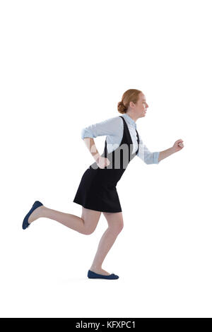 Young female executive gesturing against white background Stock Photo ...