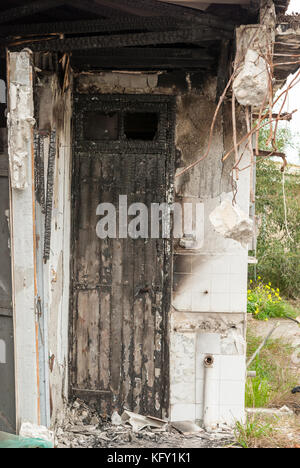 Burned house in abandoned hospital Stock Photo - Alamy