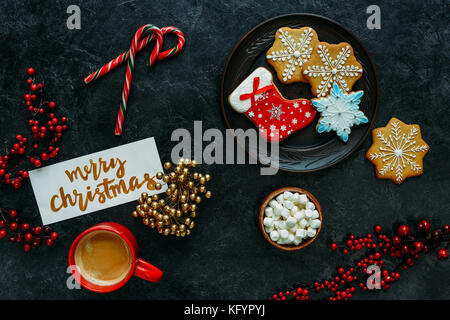 Merry Christmas. Christmas candy canes, gingerbreads of different ...