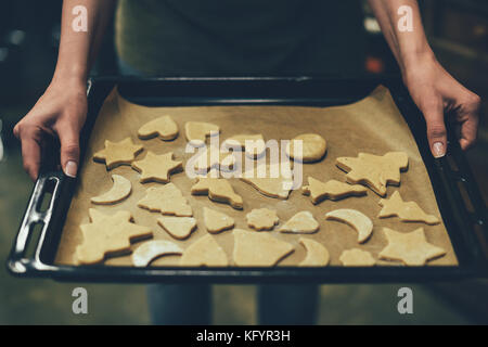person baking christmas cookies Stock Photo - Alamy
