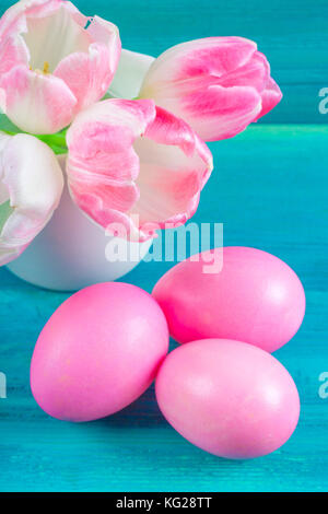 Spring easter tulip on blue wooden background Stock Photo - Alamy