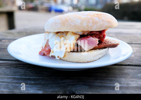 A tasty, mouth watering, breakfast bap made up of Sausage, bacon and ...