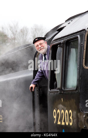 A steam engine driver and Black Prince locomotive on the narrow gauge ...