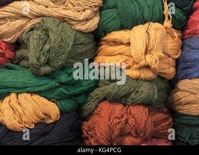 Colorful stacks of wool for fabrics and cloths in Iran Stock Photo - Alamy