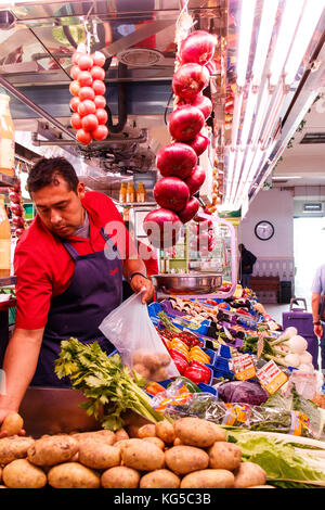 market workers performing their work one working day Stock Photo - Alamy