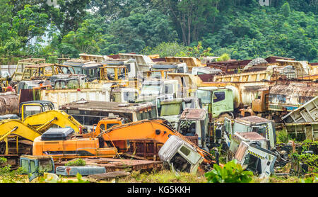 Old junkyard of car and truck parts at seashore. Kauai, Hawaii Stock ...