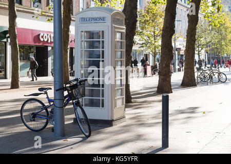 A white telephone box in Kingston-upon-Hull, East Yorkshire, England ...