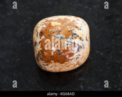 polished sandy Jasper gemstone on dark Stock Photo - Alamy