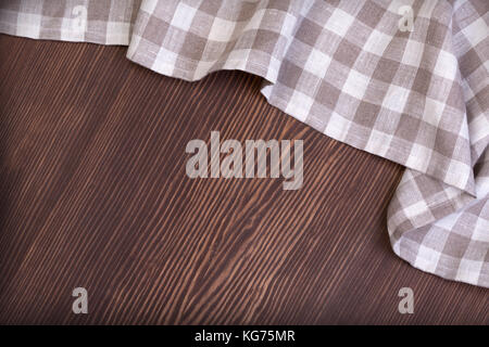 Handmade tablecloth from right side wooden table top view. Food ...