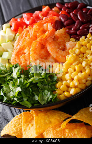 Fresh avocado and shrimps salad with nachos on side Stock Photo - Alamy