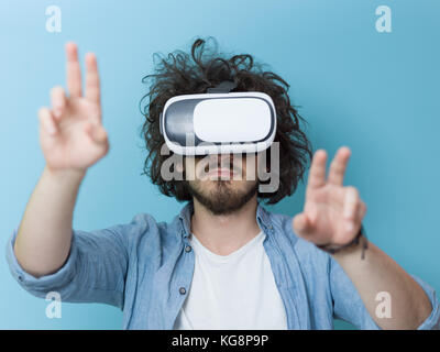 happy man getting experience using VR-headset glasses of virtual ...
