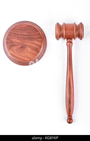 gavel on a stand on a wooden background Stock Photo - Alamy