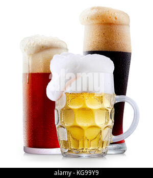 Mug collection of frosty dark red and light beer with foam isolated on ...