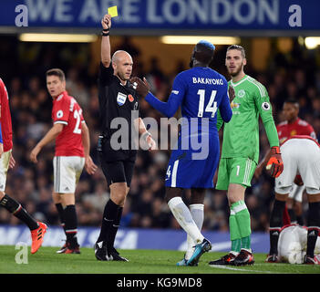 Tiemoue Bakayoko of Chelsea gets a yellow card from referee Anthony ...