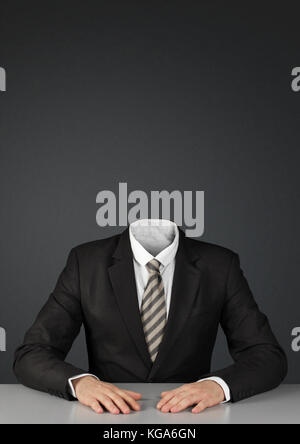 Man without head on dark concrete background Stock Photo - Alamy