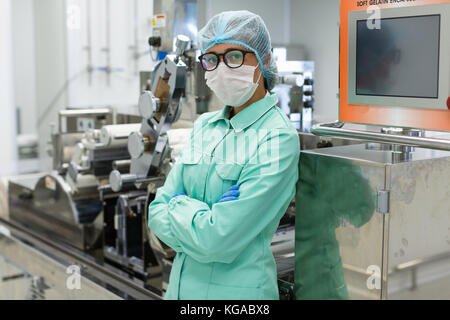 scientist standing near control panel Stock Photo - Alamy