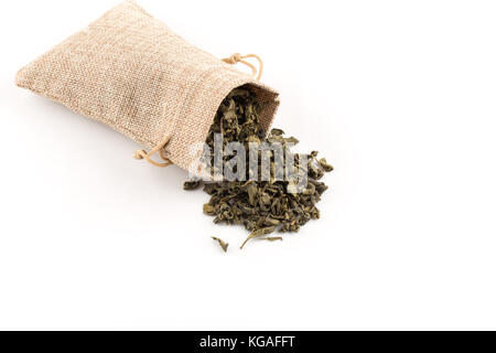 Gunpowder green tea in hessian sack closeup photo for background Stock ...