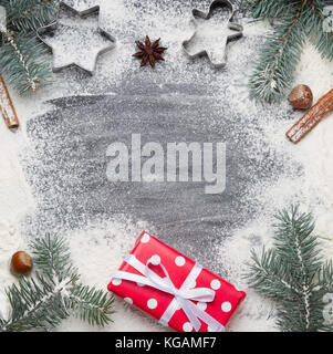 Gingerbread cookie dough and christmas cookie cutters. Baking holiday ...