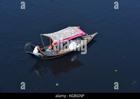Dhaka, Bangladesh. 06th Nov, 2017. A Bangladeshi people walk through a ...