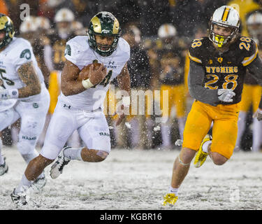 Colorado State running back Izzy Matthews (24) is stopped by Florida ...