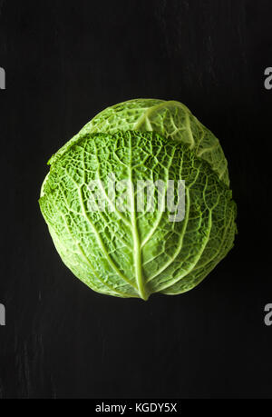 Savoy cabbage isolated on black Stock Photo - Alamy