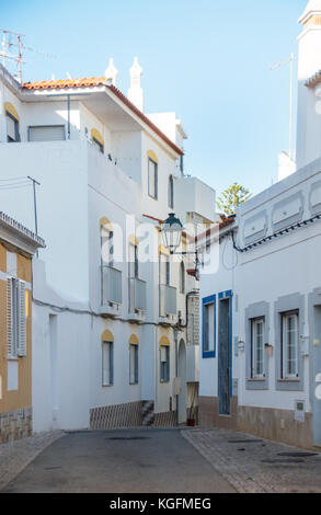 Street view of the town of Alvor, Algarve, Portugal Stock Photo - Alamy