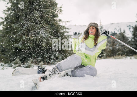 sport woman on the slope of mountain looking ahead Stock Photo - Alamy