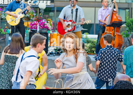 Young people jitterbugging at an outdoor dance exhibition in Seattle ...