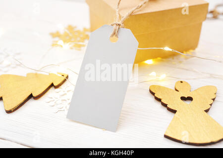 Composition with Christmas gift, rope and beautiful Christmas ...