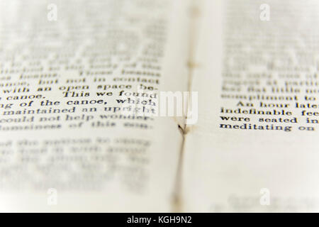 old book open page script reading Stock Photo - Alamy