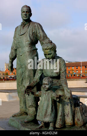 Hull Marina - Immigrants statue by Neil Hadlock Stock Photo - Alamy