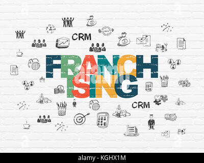 Business concept: Franchising on wall background Stock Photo - Alamy