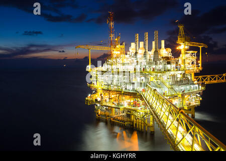 Onshore oil and gas processing plant showing storage tanks pipework ...