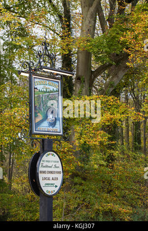 The Tunnel Inn pub sign next to Sapperton Canal Tunnel in autumn ...