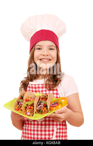 Happy little girl cook with tacos and thumb up Stock Photo - Alamy