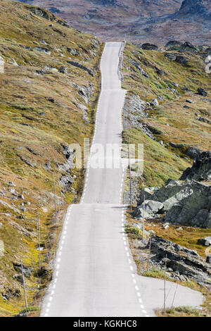 Asphalt road across the mountains Stock Photo - Alamy