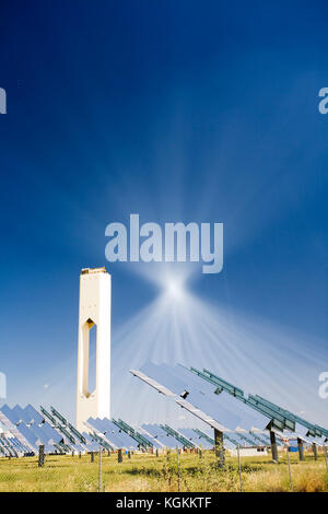 Concentrating solar power plant. Power lines in front of the heliostat ...