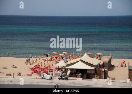 Beach clubs on San Giuliano beach, Erice, Sicily Stock Photo - Alamy
